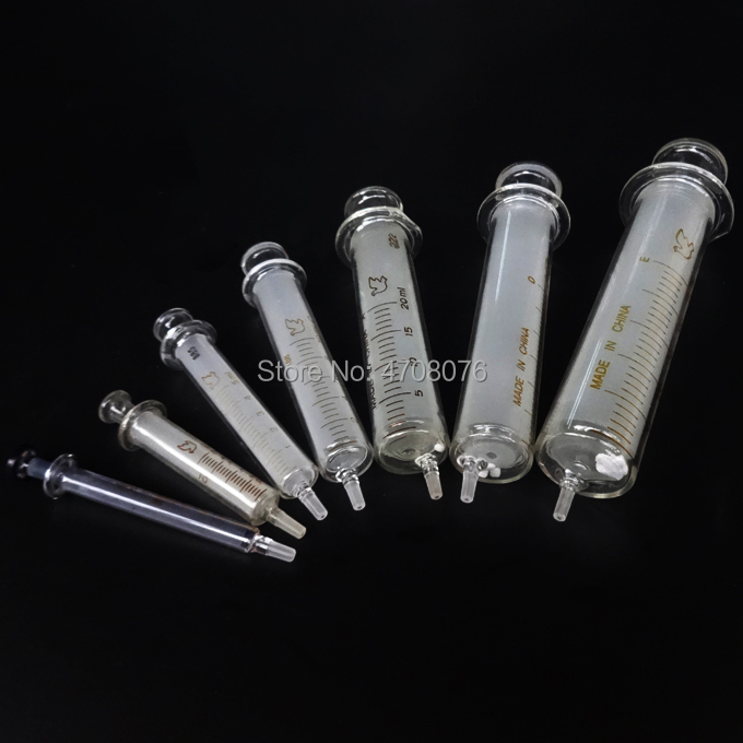 Glass syringe with plastic cover Needle tubing without pinhead Glass ...